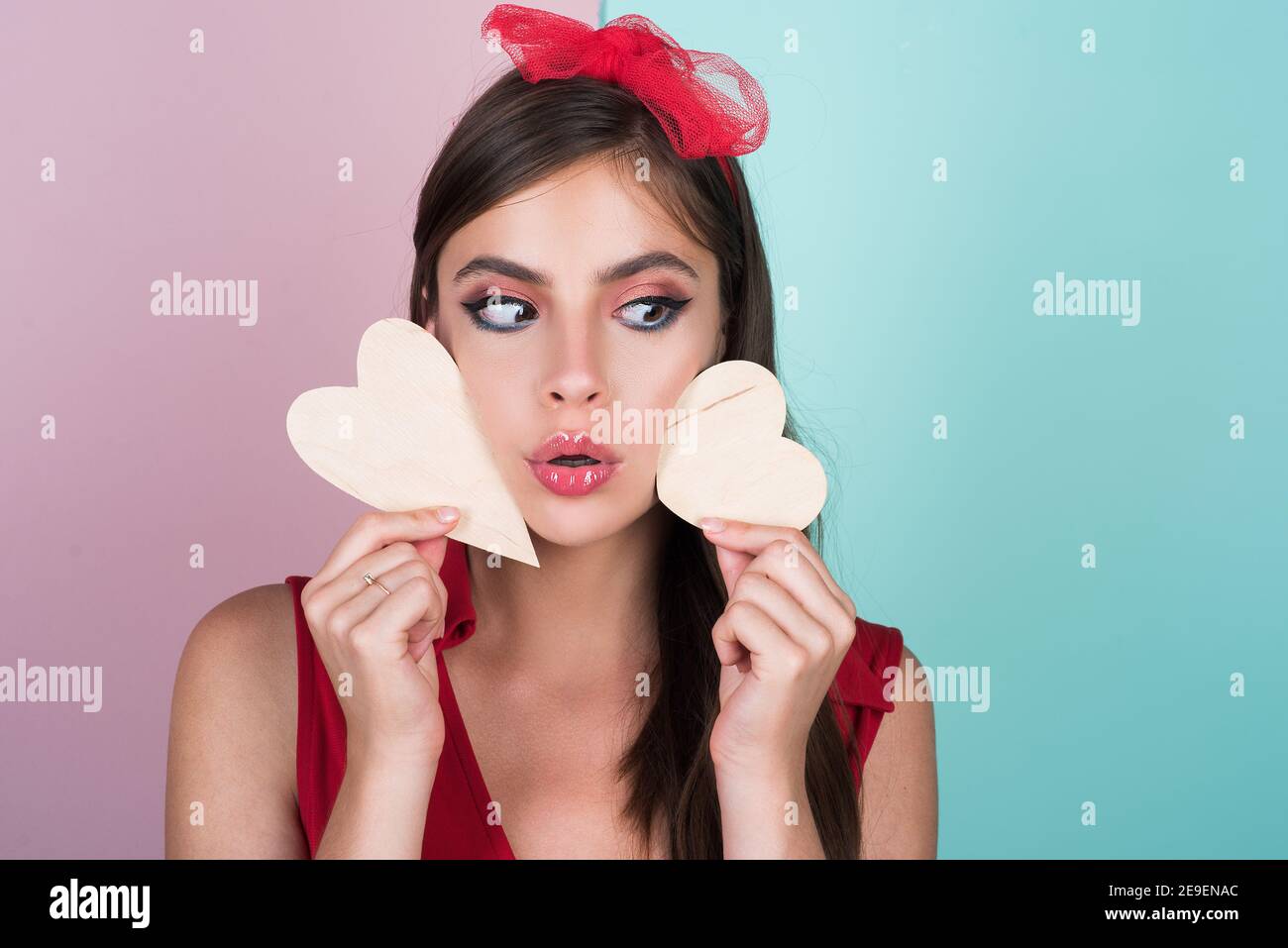 Valentine day heart. Pin up girl with hearts. Lovelu makeup Stock Photo ...
