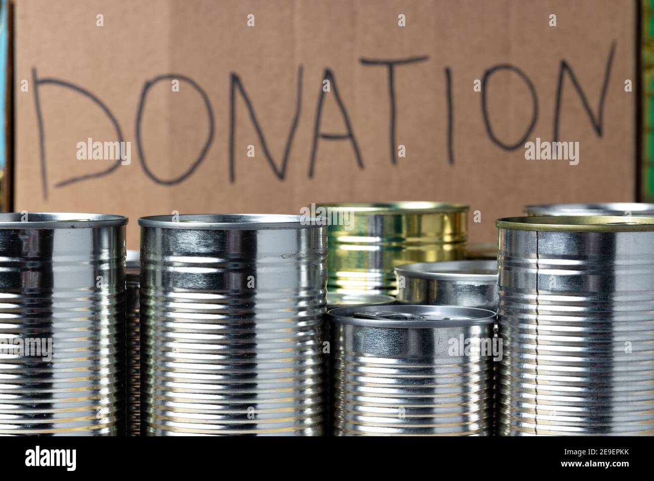 Food donations on the table. Text Donation Stock Photo - Alamy