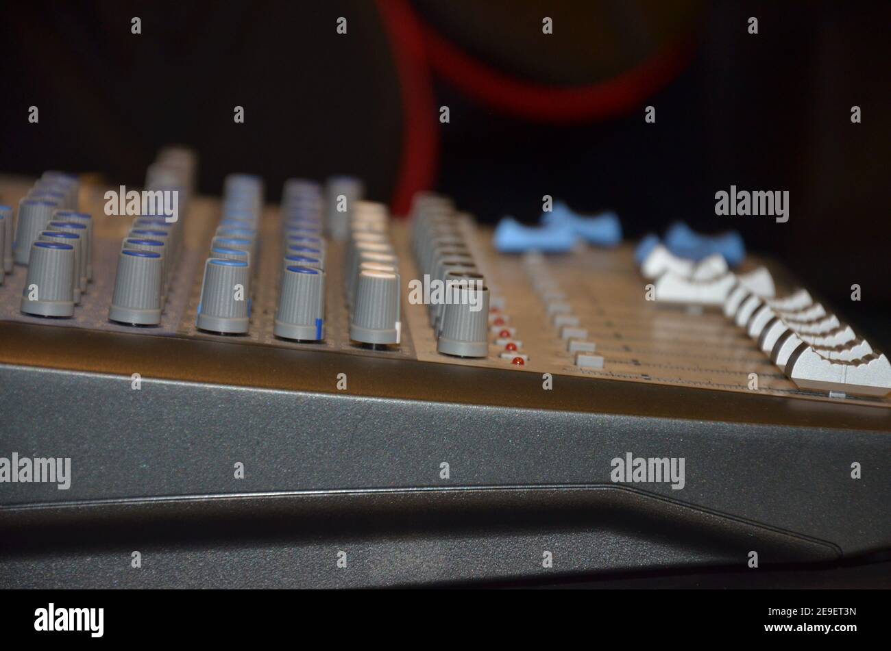 Professional audio mixing console with faders and adjusting knobs Stock ...