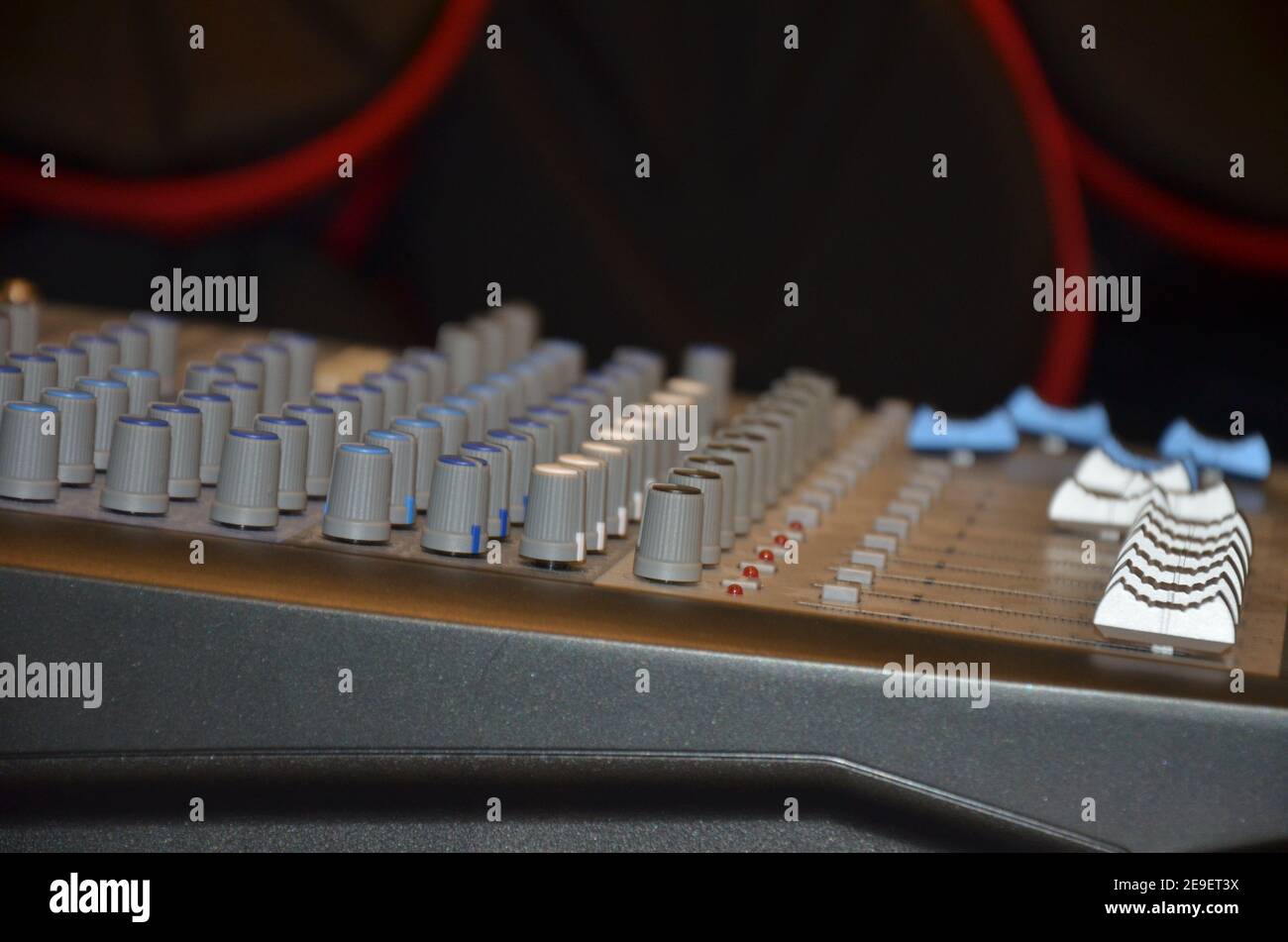 Professional audio mixing console with faders and adjusting knobs Stock ...