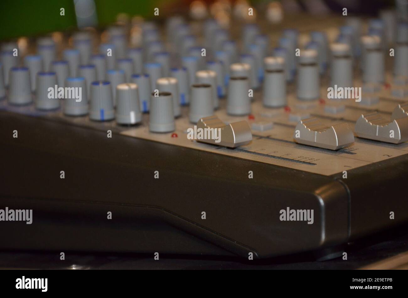 Professional audio mixing console with faders and adjusting knobs Stock ...