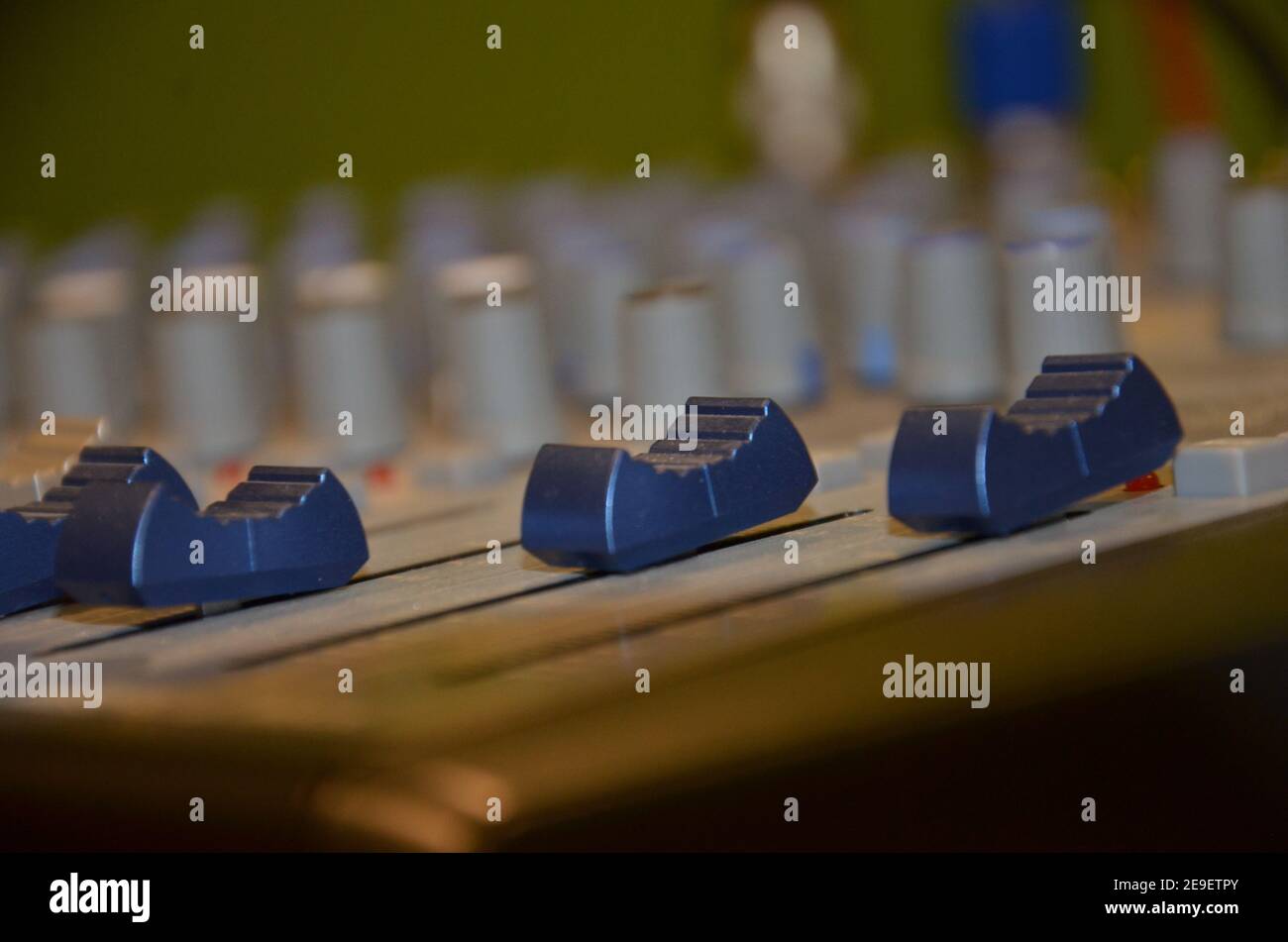 Professional audio mixing console with faders and adjusting knobs Stock ...