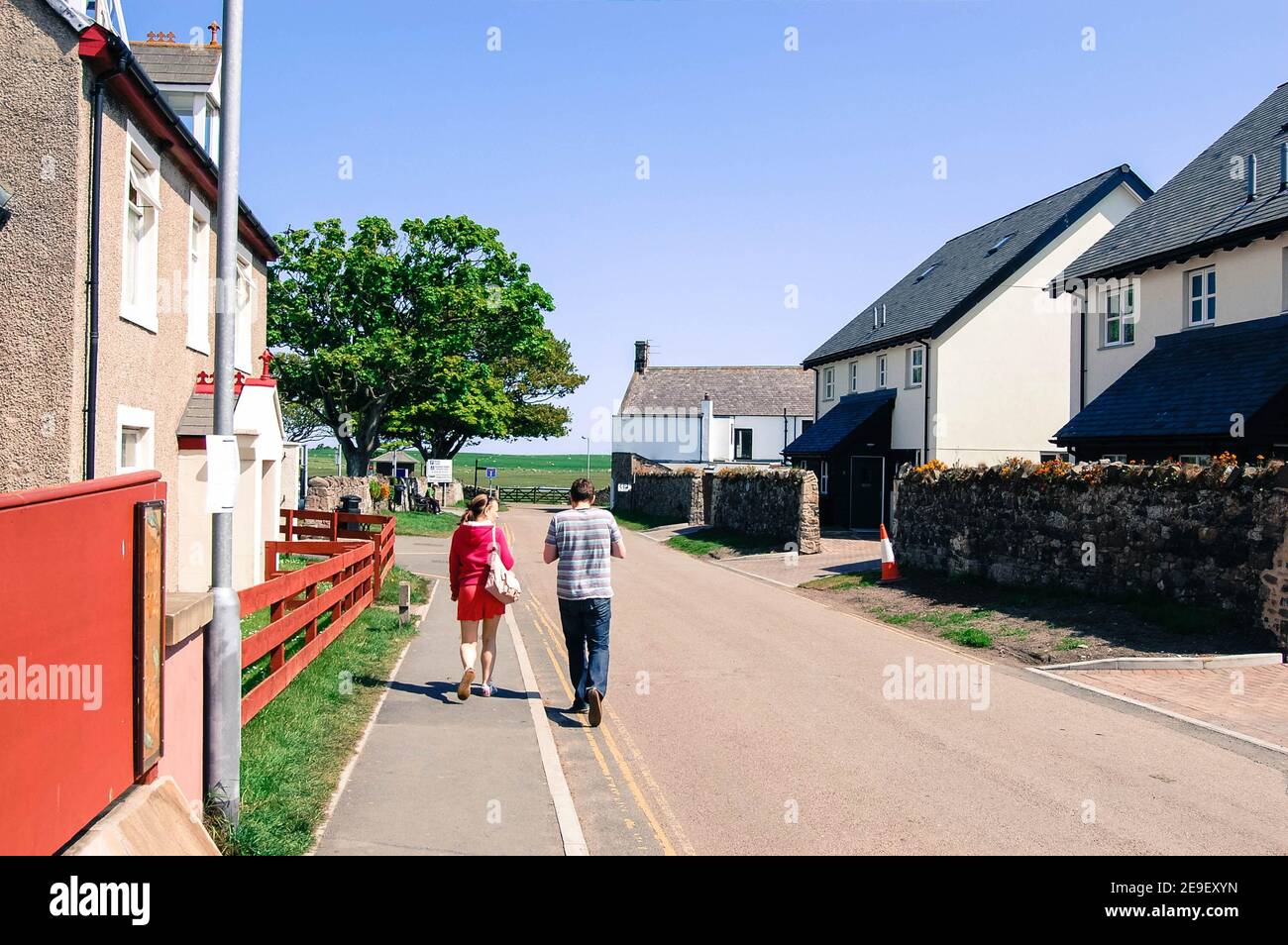 Northumberland Lindisfarne street walking famous road path outside old ...