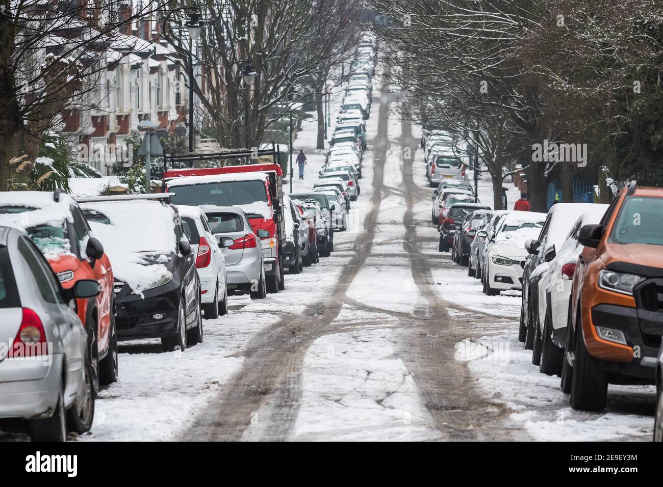 Snow covers parked cars and roads around Crouch End area as the capital ...