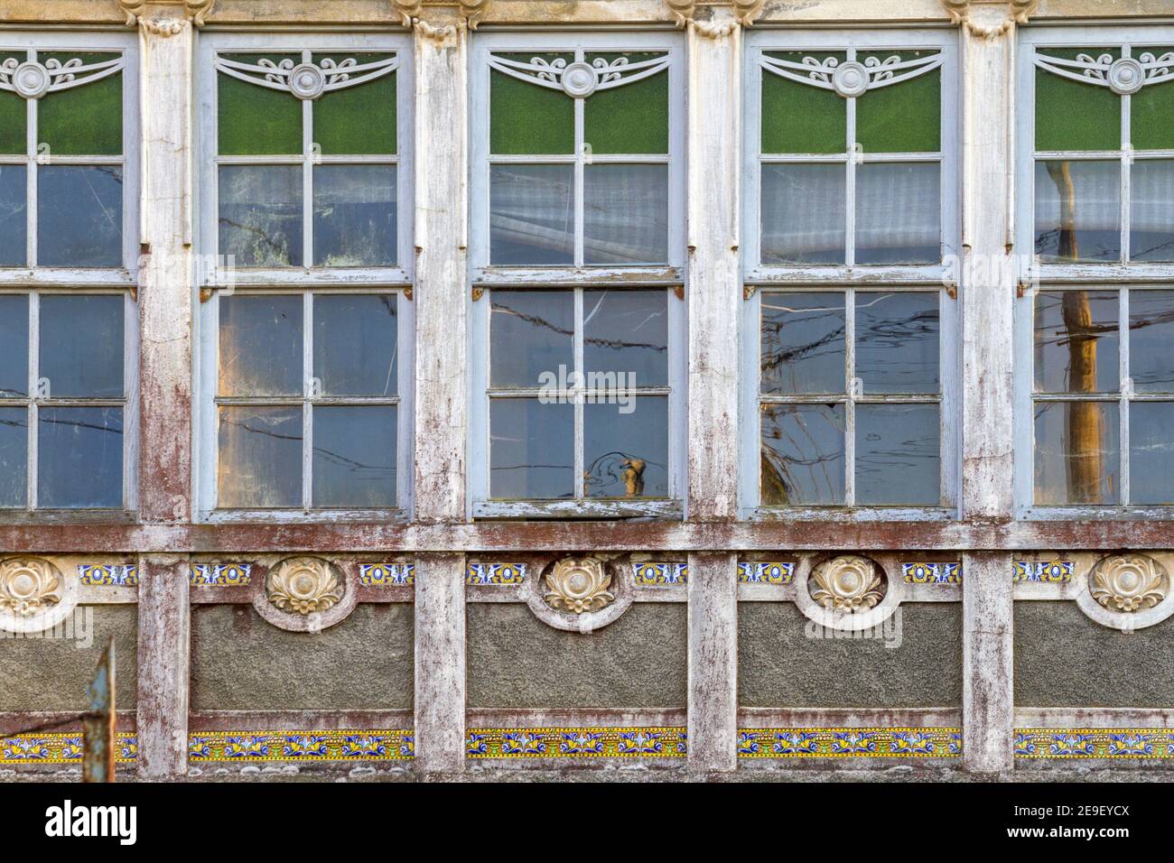 Closer shot of a vintage building's old windows Stock Photo - Alamy