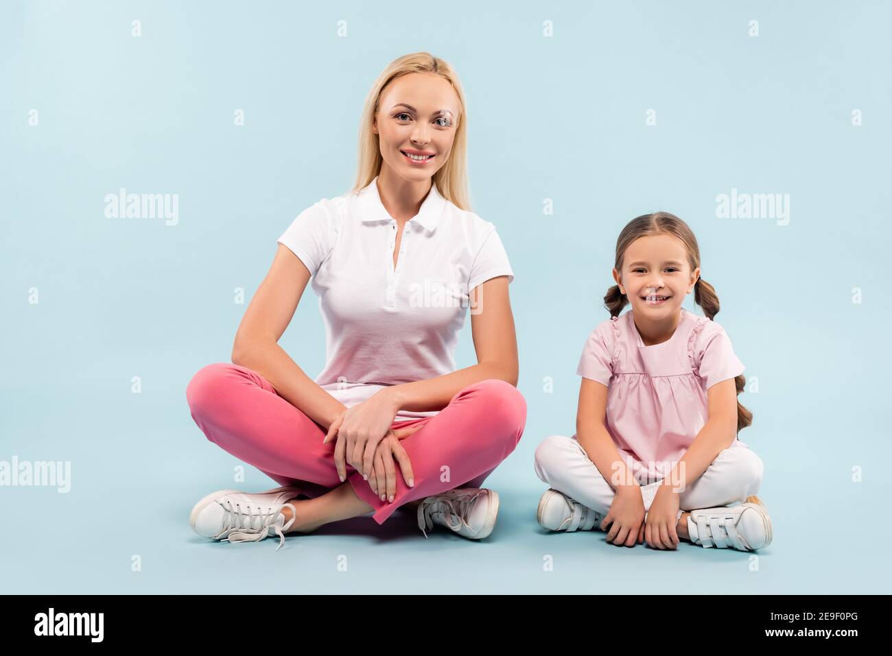 Child legs crossed hi-res stock photography and images - Alamy