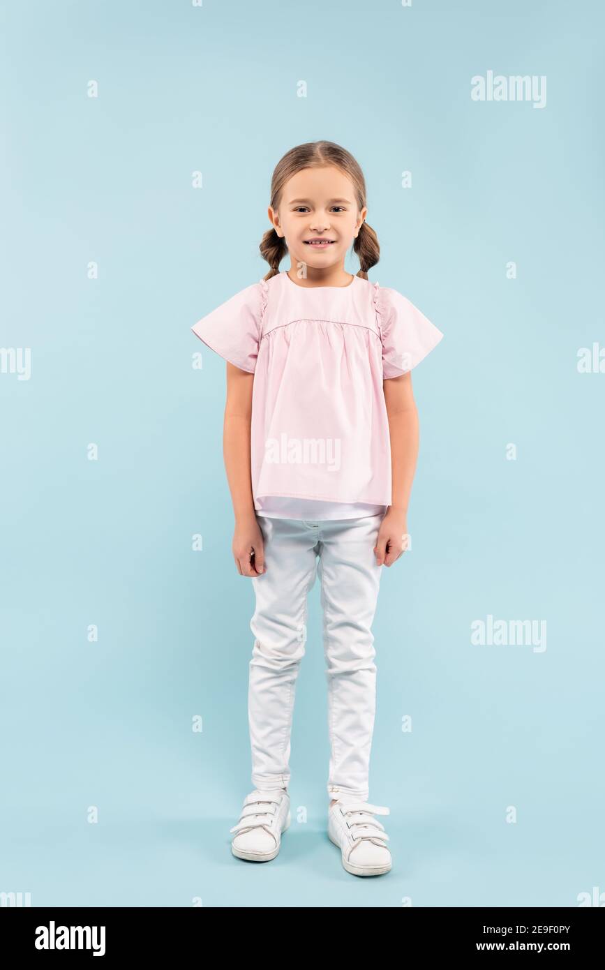 Full length cheerful child hi-res stock photography and images - Alamy