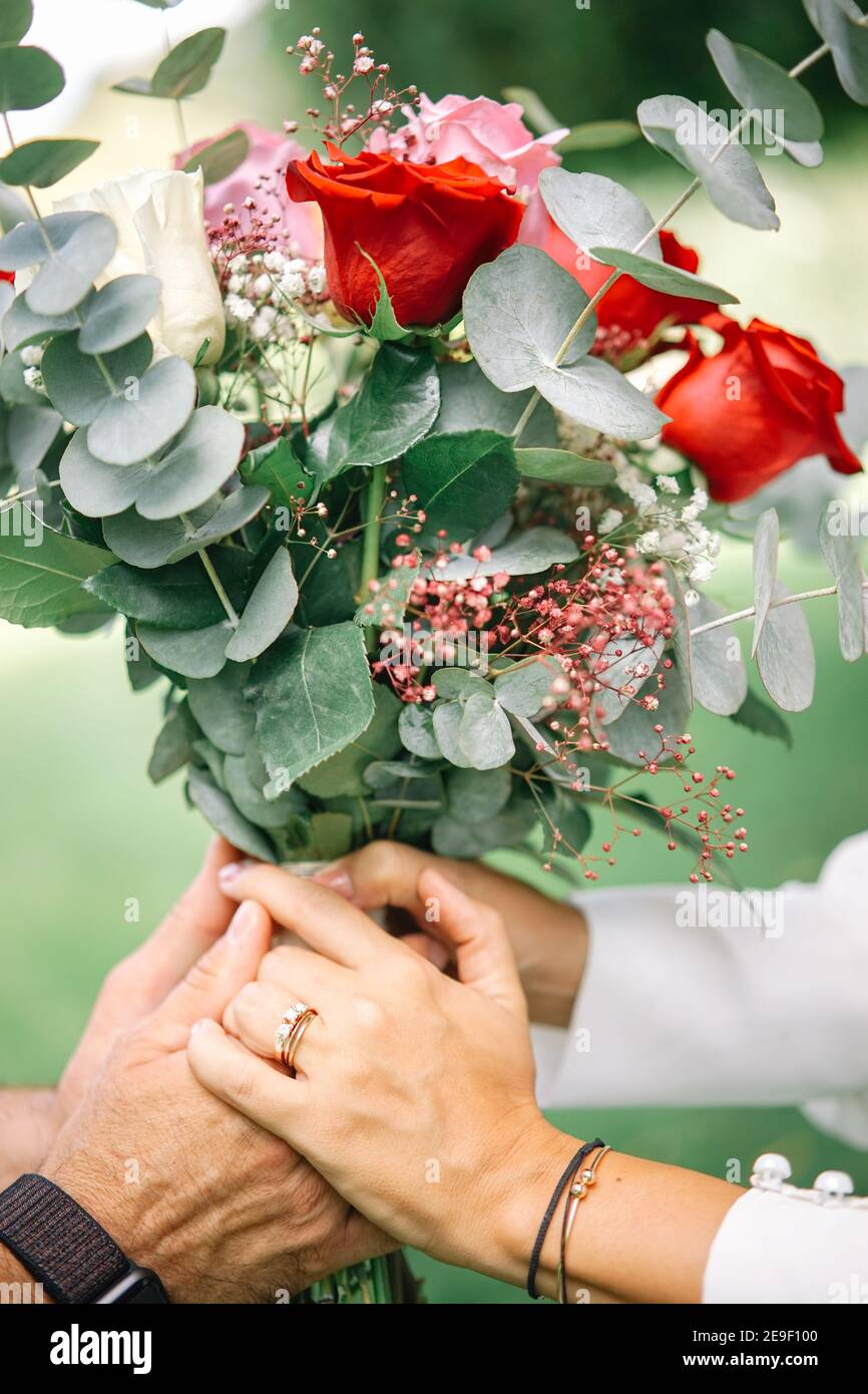 wedding bouquet , lovely couple hands Stock Photo - Alamy