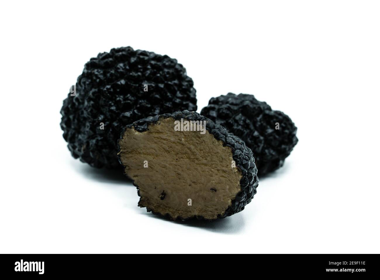 Black truffle isolated on white background Stock Photo - Alamy