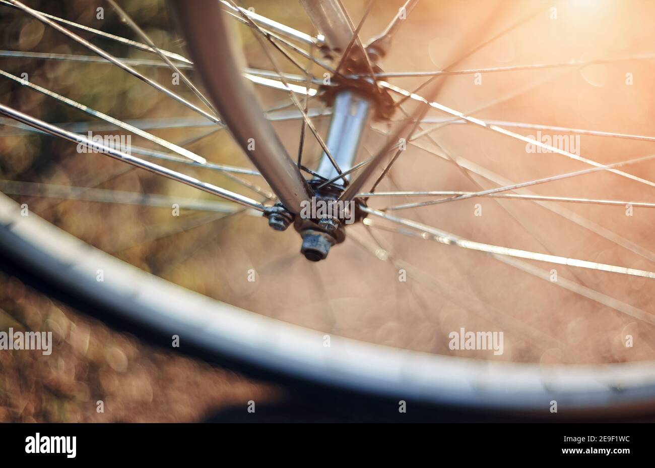 Forward wheel of the bicycle close up with bokeh Stock Photo - Alamy