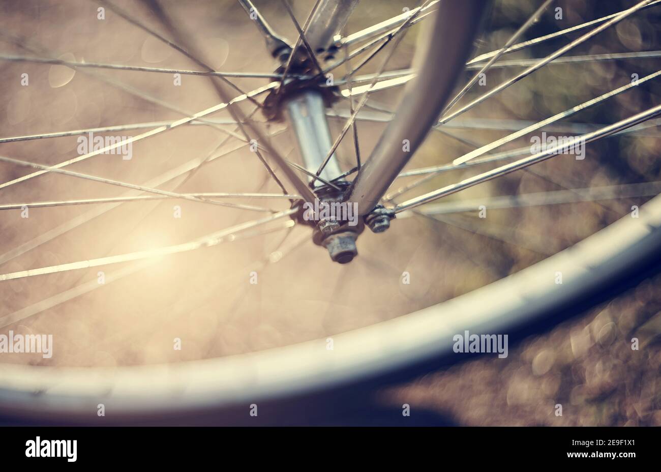Forward wheel of the bicycle close up with bokeh Stock Photo - Alamy