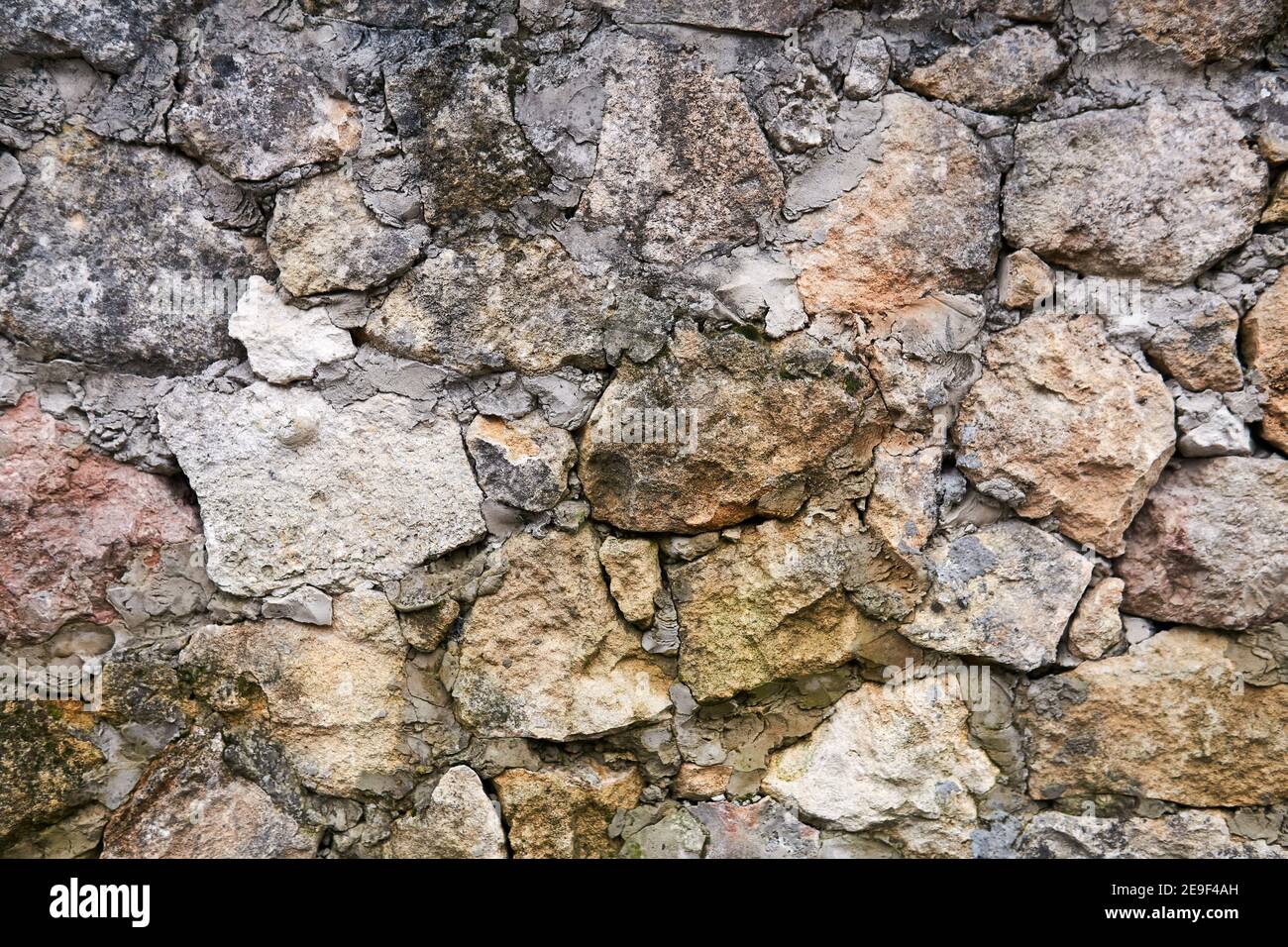 background, texture - ancient rough masonry from natural raw stone ...