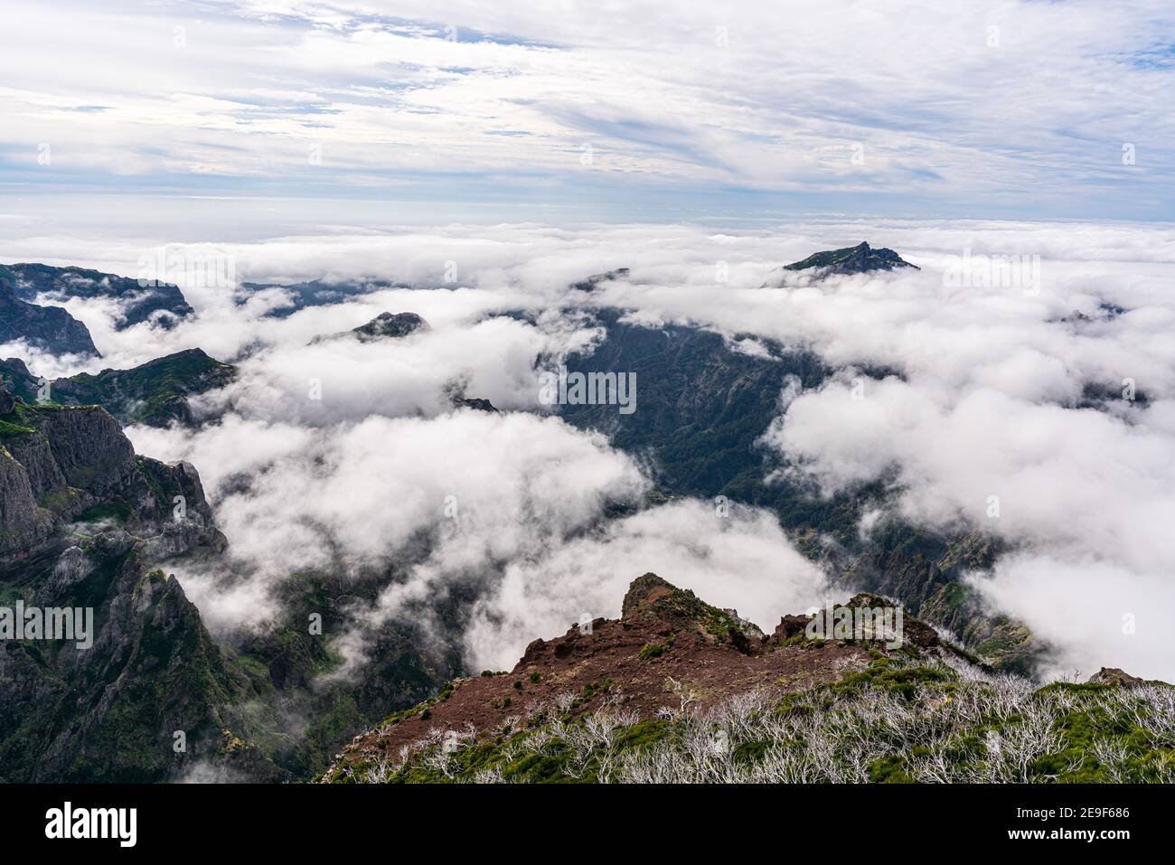 Beautiful mountain scenery near the mountain peak Pico Ruivo on Madeira Island - Cloud covered ...