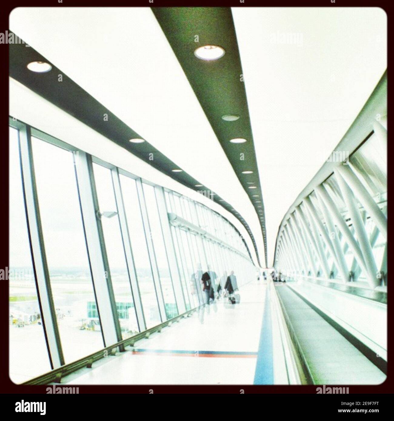 Travellers make their way to a gate at Gatwick airport (from a set of ...