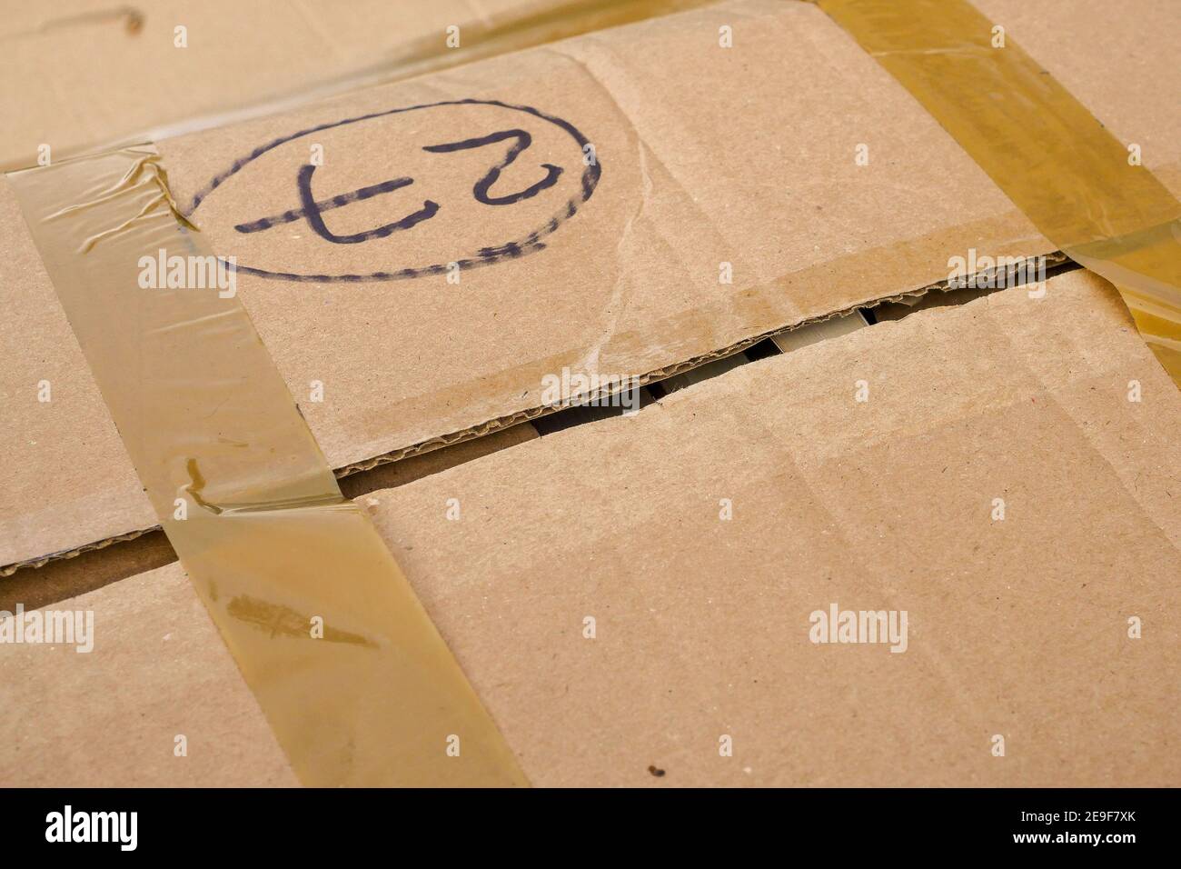 Cardboard package, detail view, Lyon, France Stock Photo - Alamy