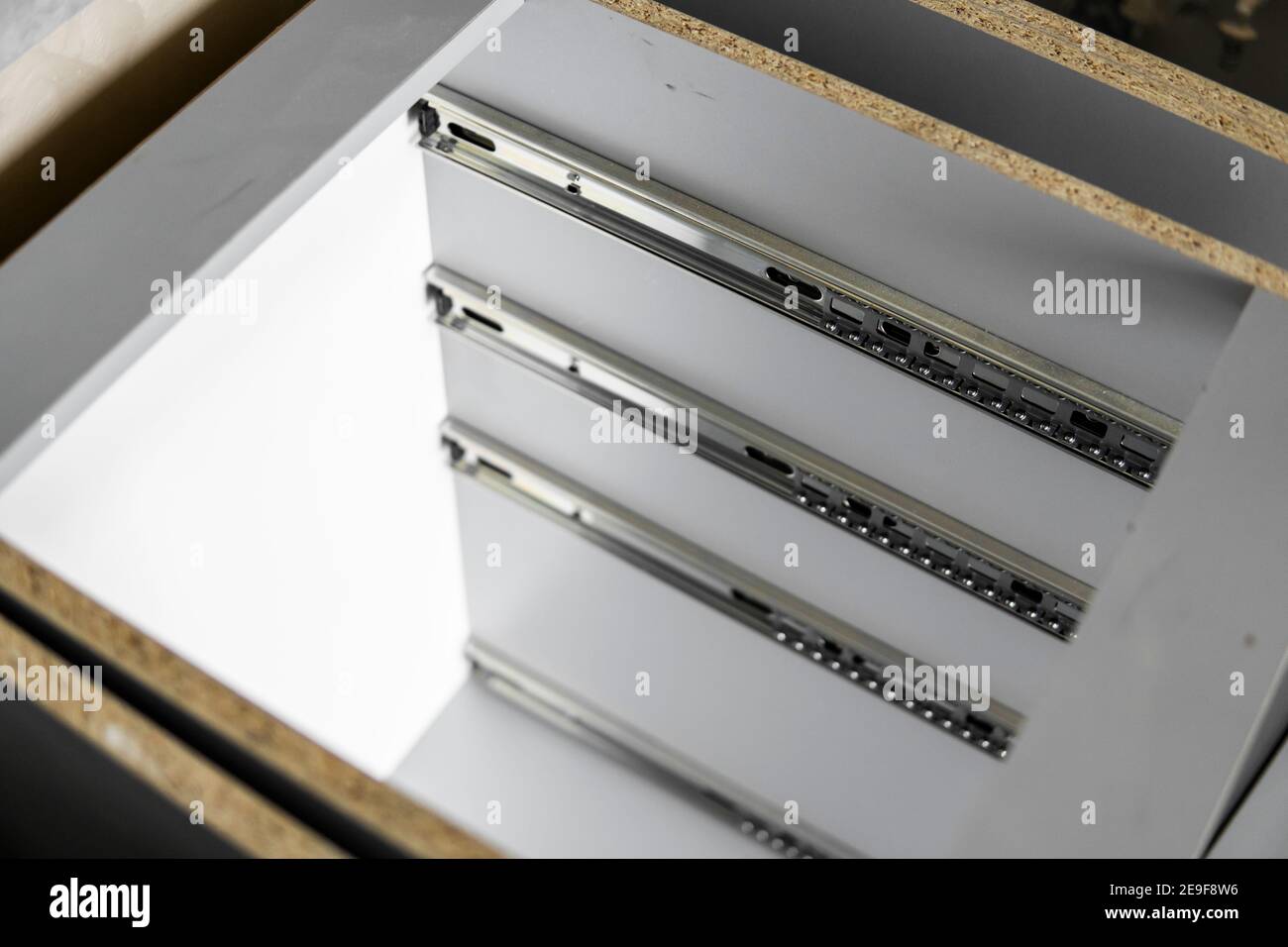 Stainless telescopic bayonet drawer slide guides, installed on a ...