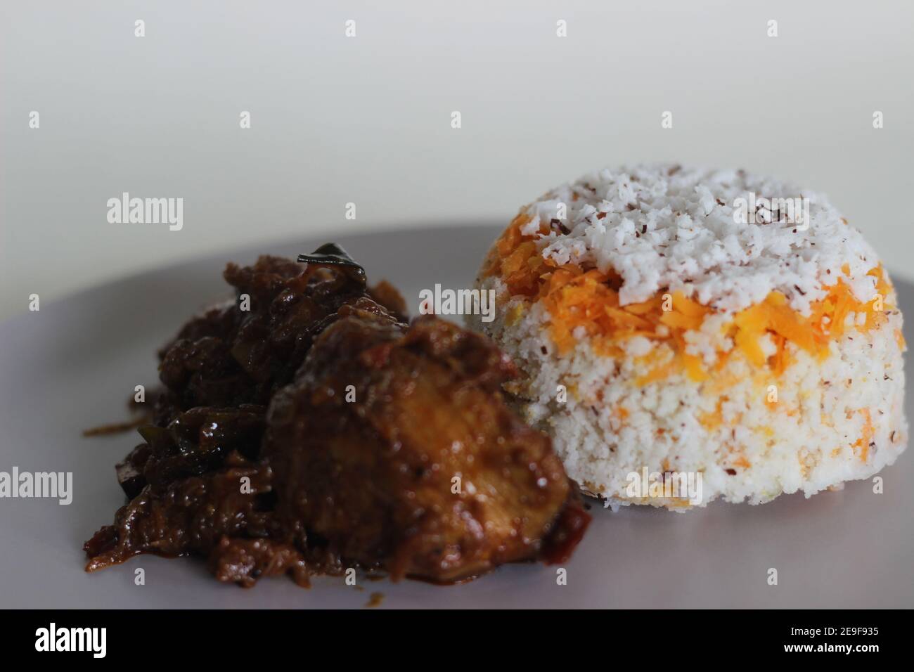 Carrot puttu, a variety of Kerala rice steam cake by adding shredded ...