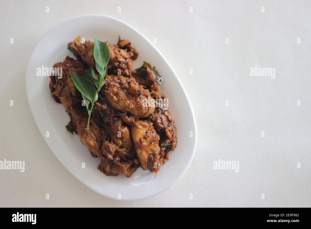 Dry gravy chicken roast prepared in Kerala style with cocunut oil and ...