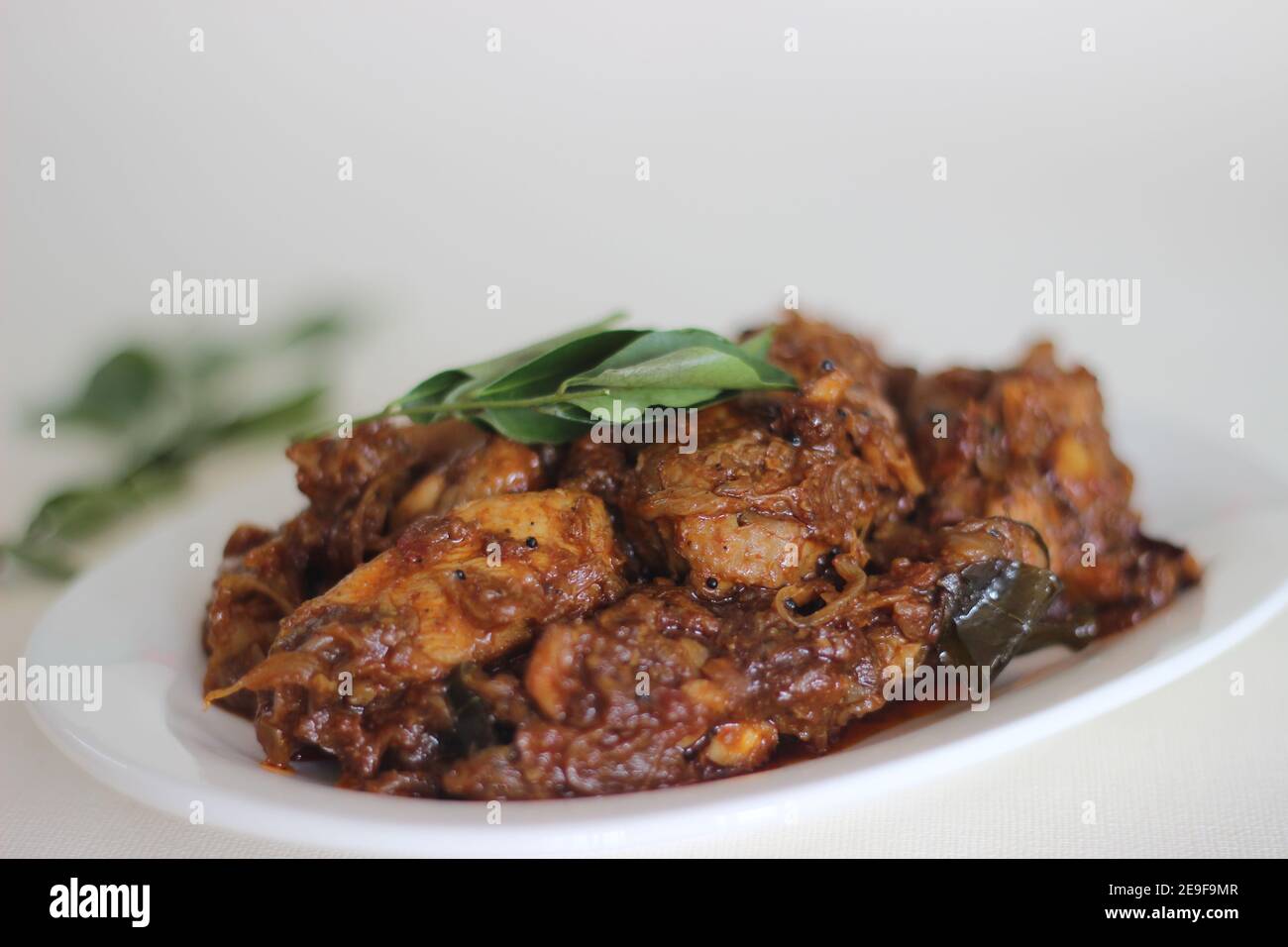 Dry gravy chicken roast prepared in Kerala style with cocunut oil and ...