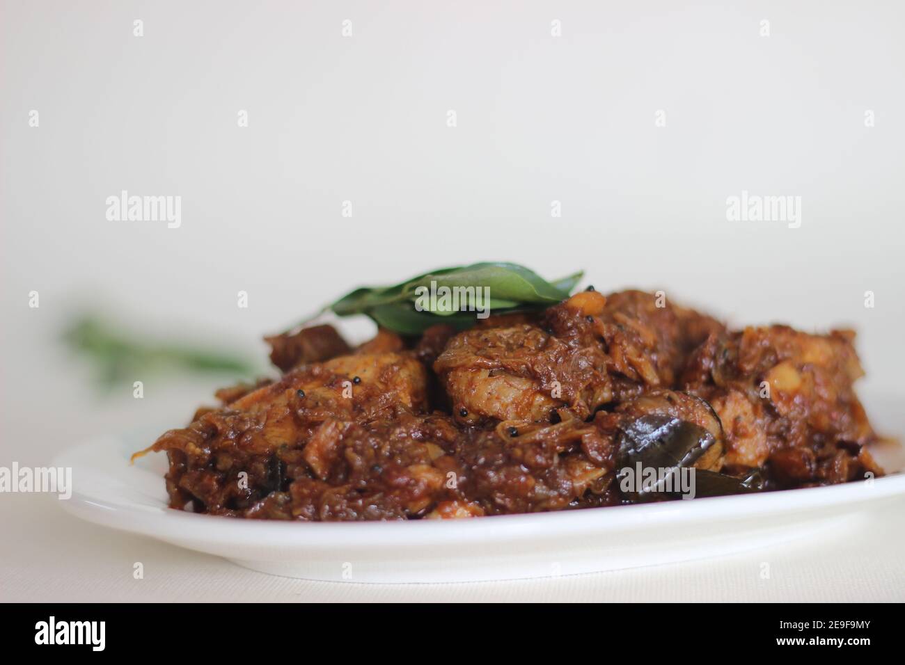 Kerala style spicy chicken roast hi-res stock photography and images ...