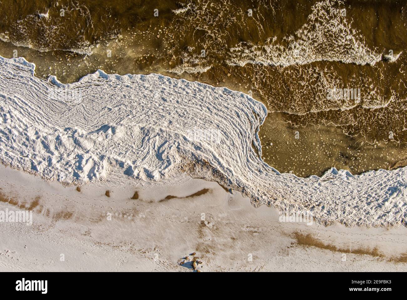 Aerial view over partialy frozen sea with white ice texture Stock Photo ...