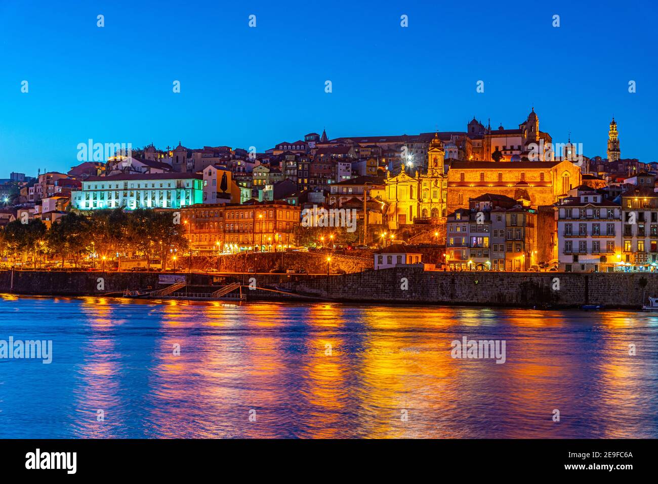 Torre dos Clerigos overlooking riverside of Douro at Porto, Portugal ...
