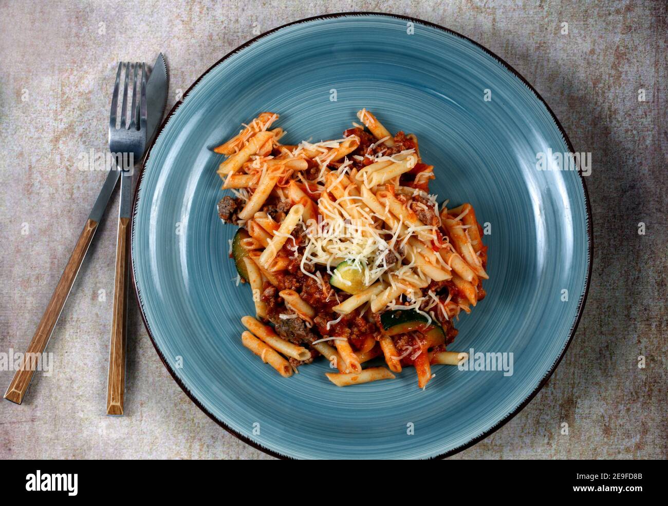 Top view of pasta with cheese and sauce Stock Photo - Alamy