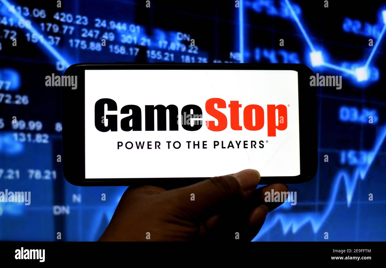 In this photo illustration a Game Stop logo seen displayed on a ...