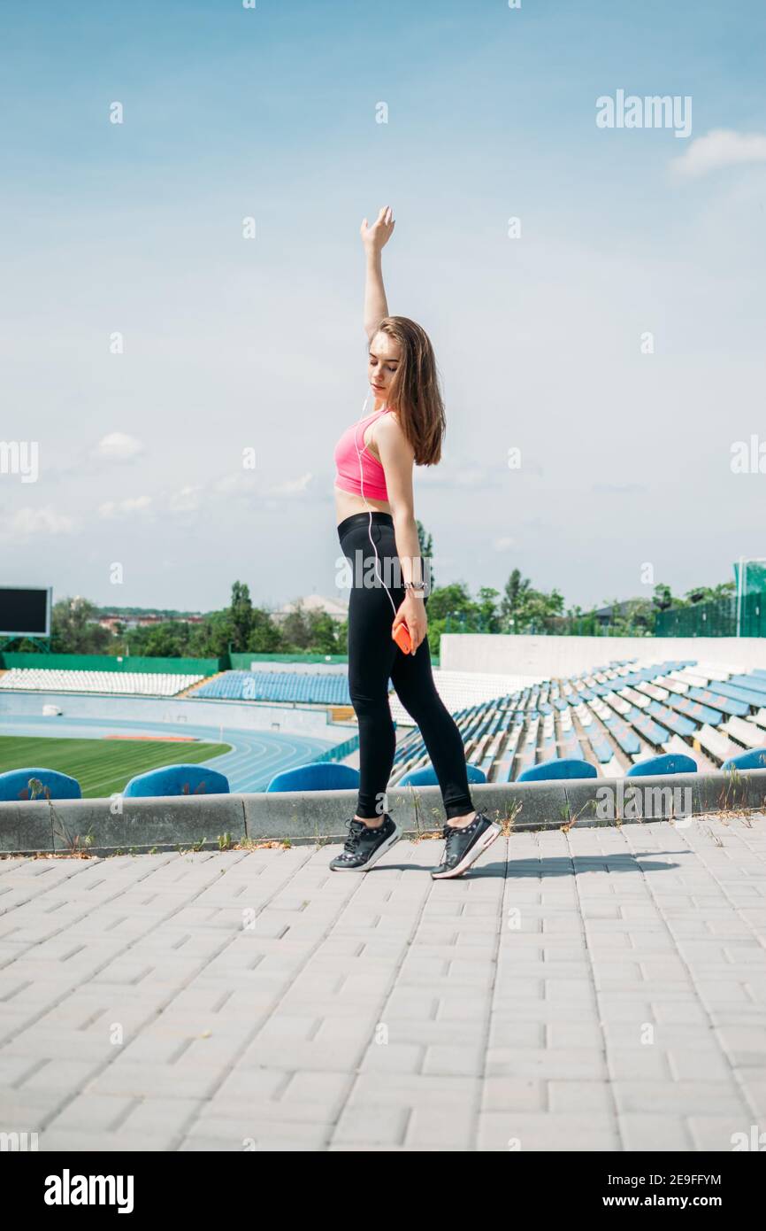 Teen Fitness, Physical activity for teenagers. Young sporty girl having ...