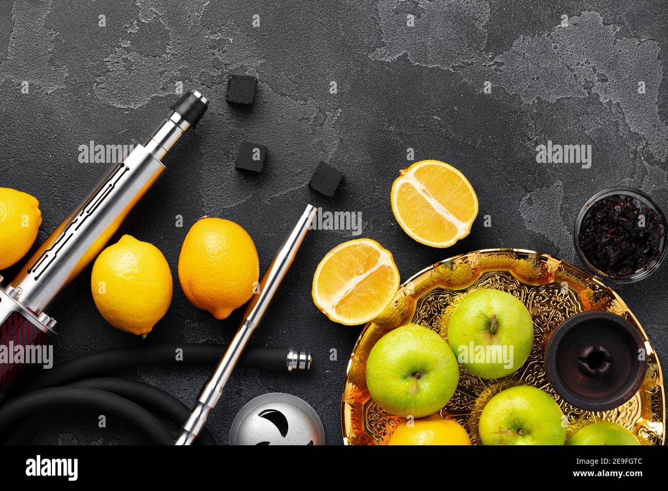 Hookah pipe and shaft with fruits on gray background Stock Photo - Alamy
