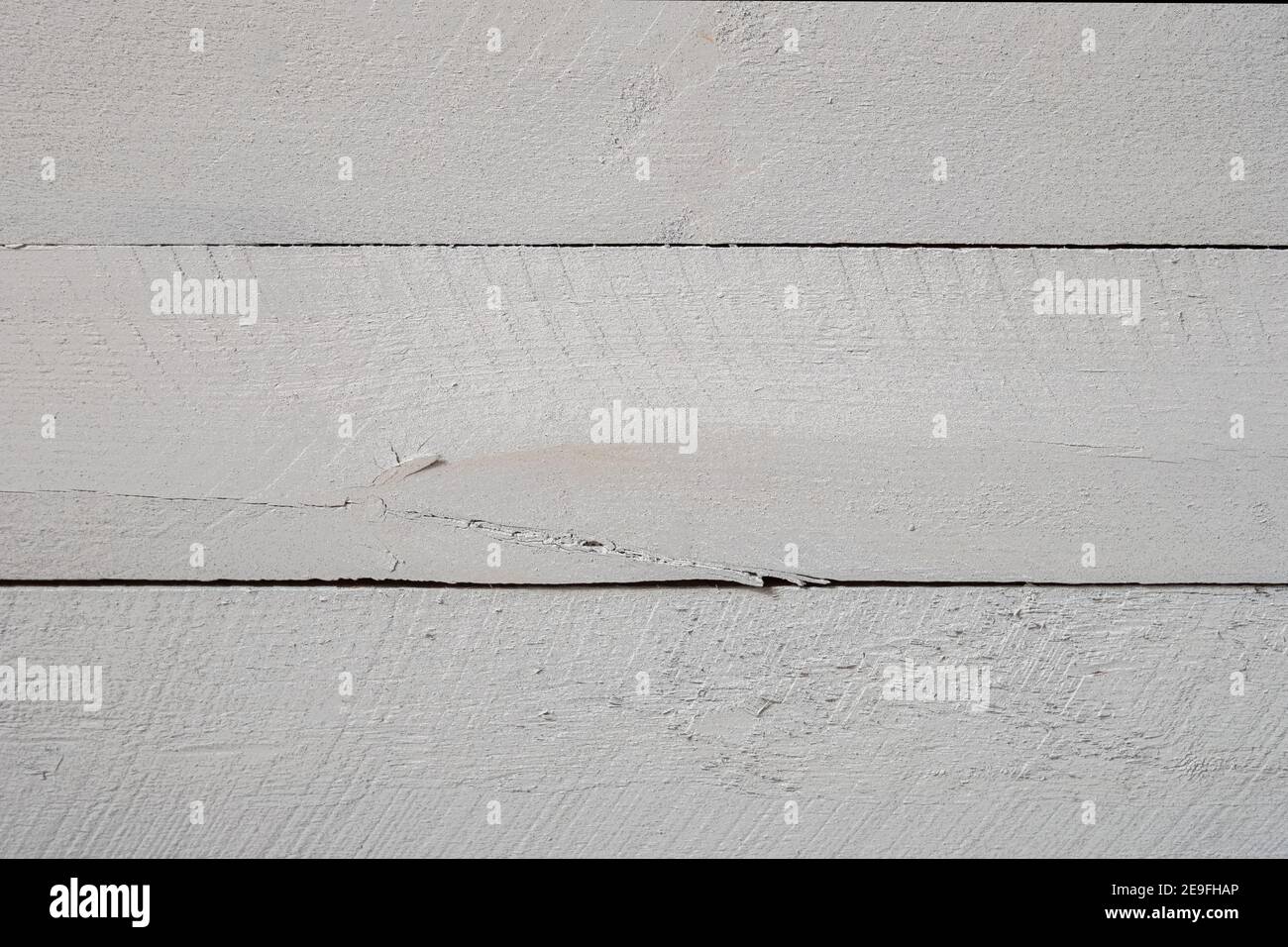 A photograph of decorative rough wood wall boards painted white Stock ...