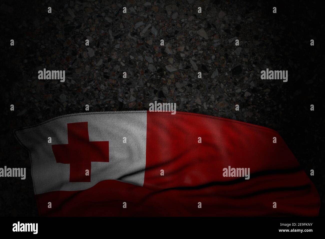 beautiful dark illustration of Tonga flag with large folds on dark ...