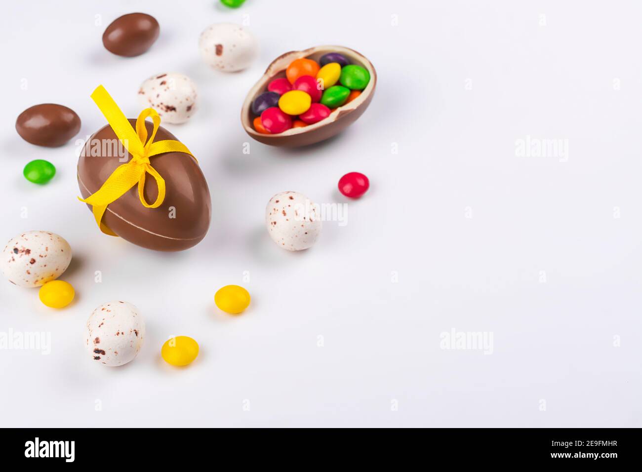 Easter chocolate eggs on pink Stock Photo - Alamy