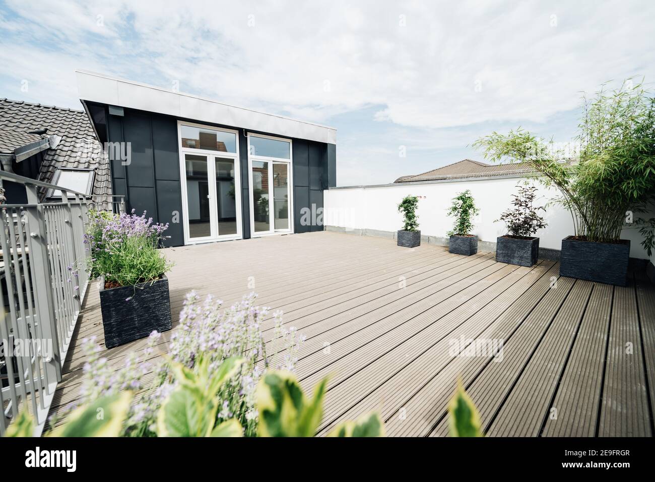 photo of a rooftop attic terrace in daylight Stock Photo - Alamy