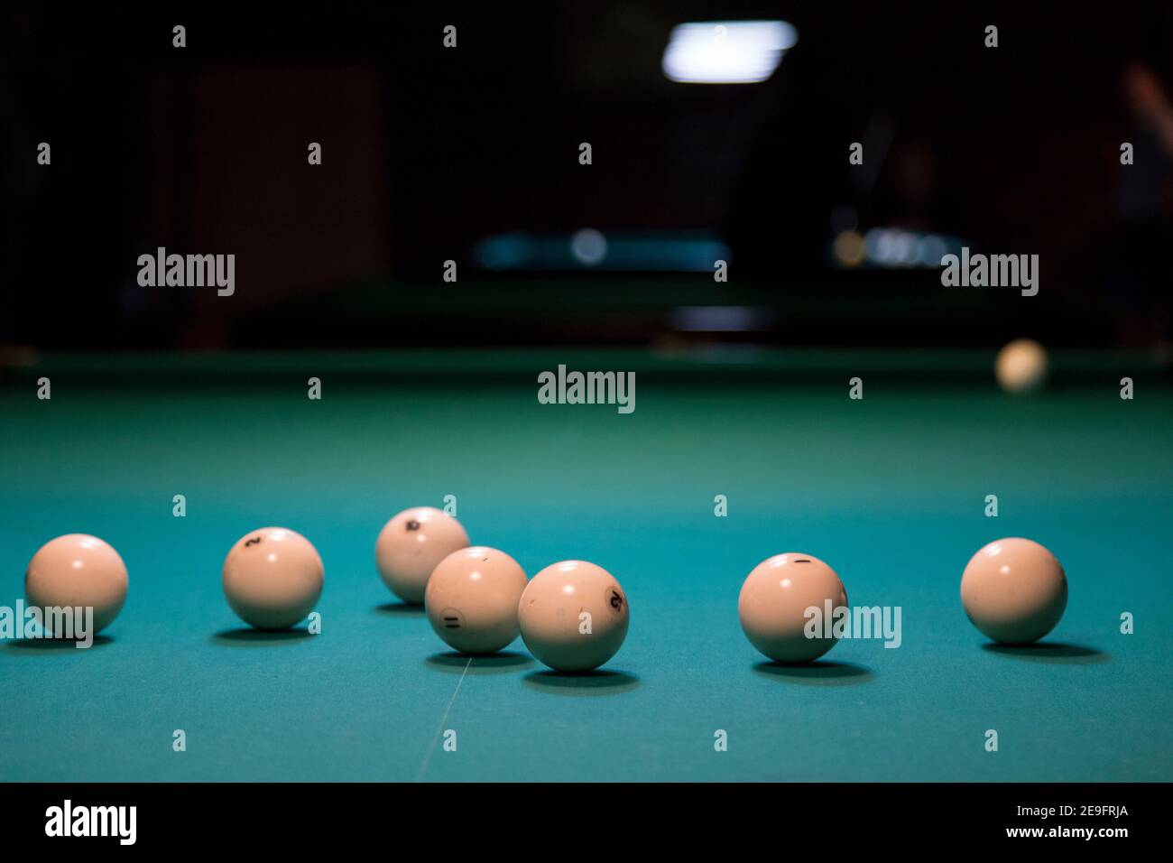 Ivoye balls and green table for russian billierd. Russian billiard have ...