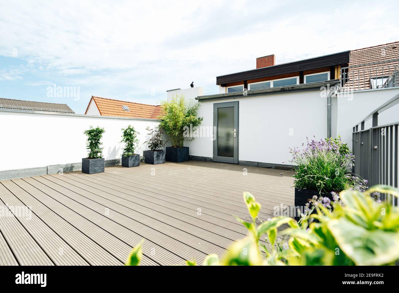photo of a rooftop attic terrace in daylight Stock Photo - Alamy