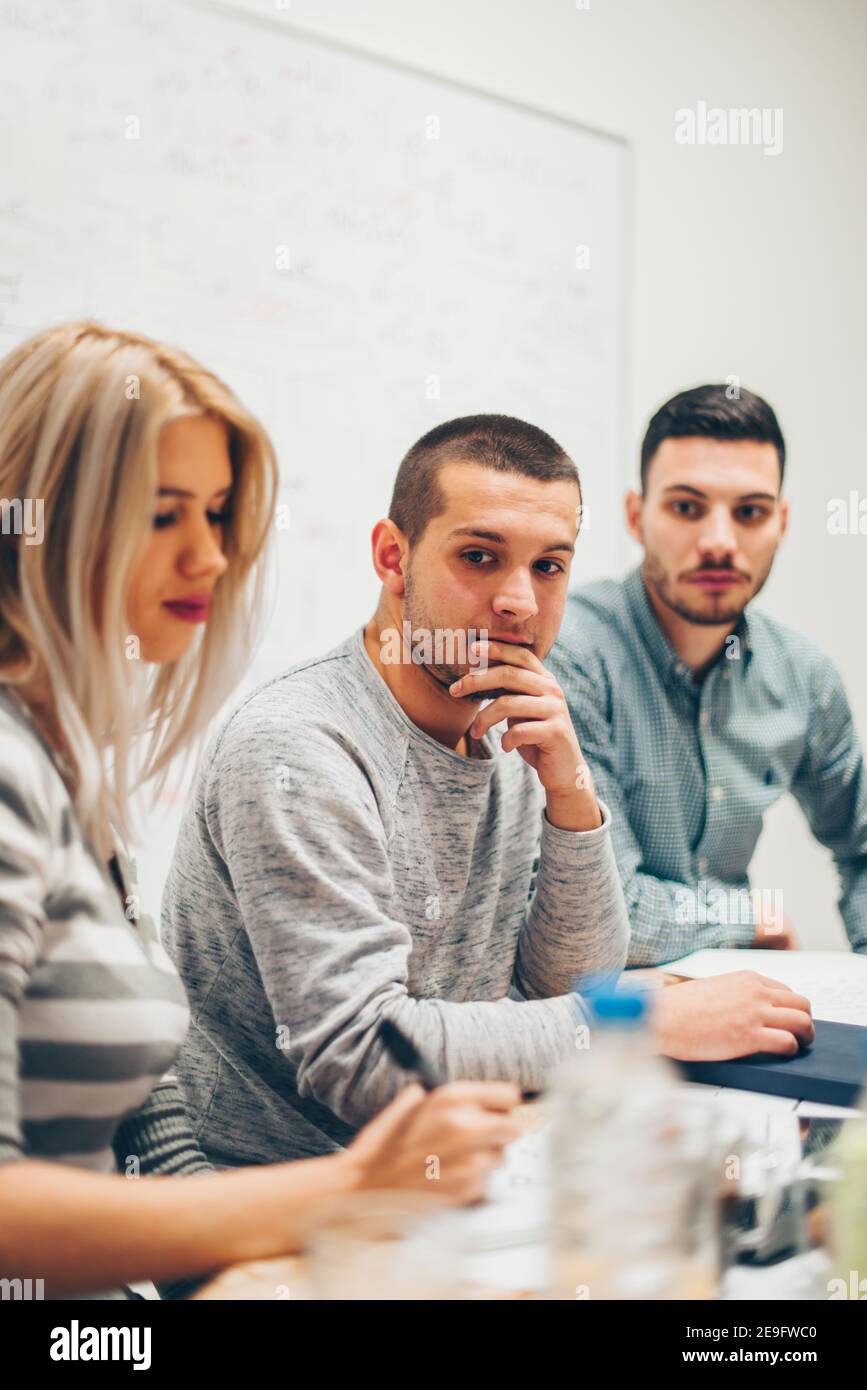 Young managers are having a meeting and making a work strategy Stock ...