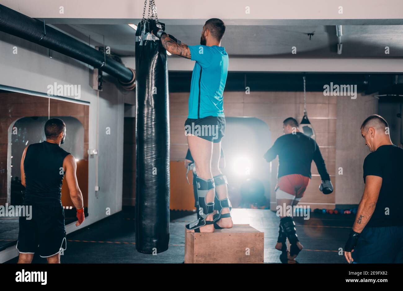 Attractive young people prepare for training Stock Photo - Alamy