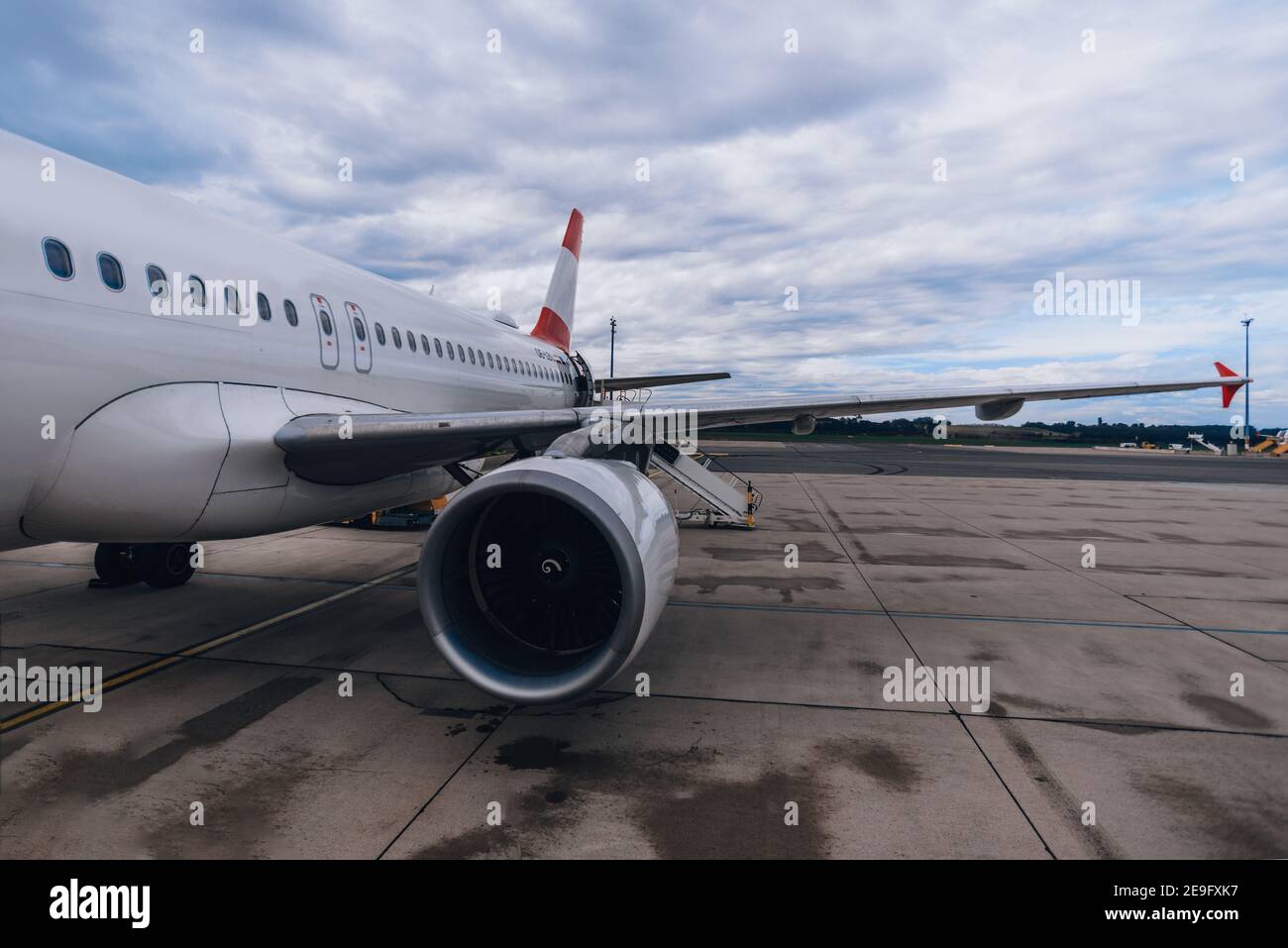 Jet propelled airplane during a boarding process at an aerodrome Stock ...