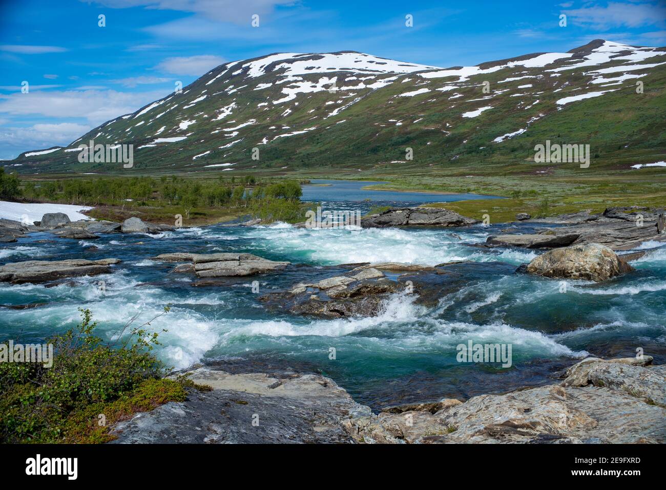 Large turquoise River landscape and mountainous valley in Padjelanta ...