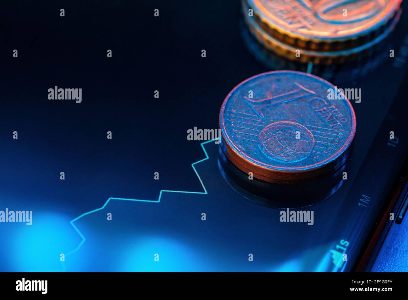 Euro coin on stock chart. Financial investment concept Stock Photo - Alamy
