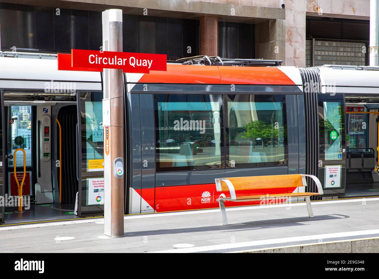 Sydney city centre and light rail train with doors open stood at ...