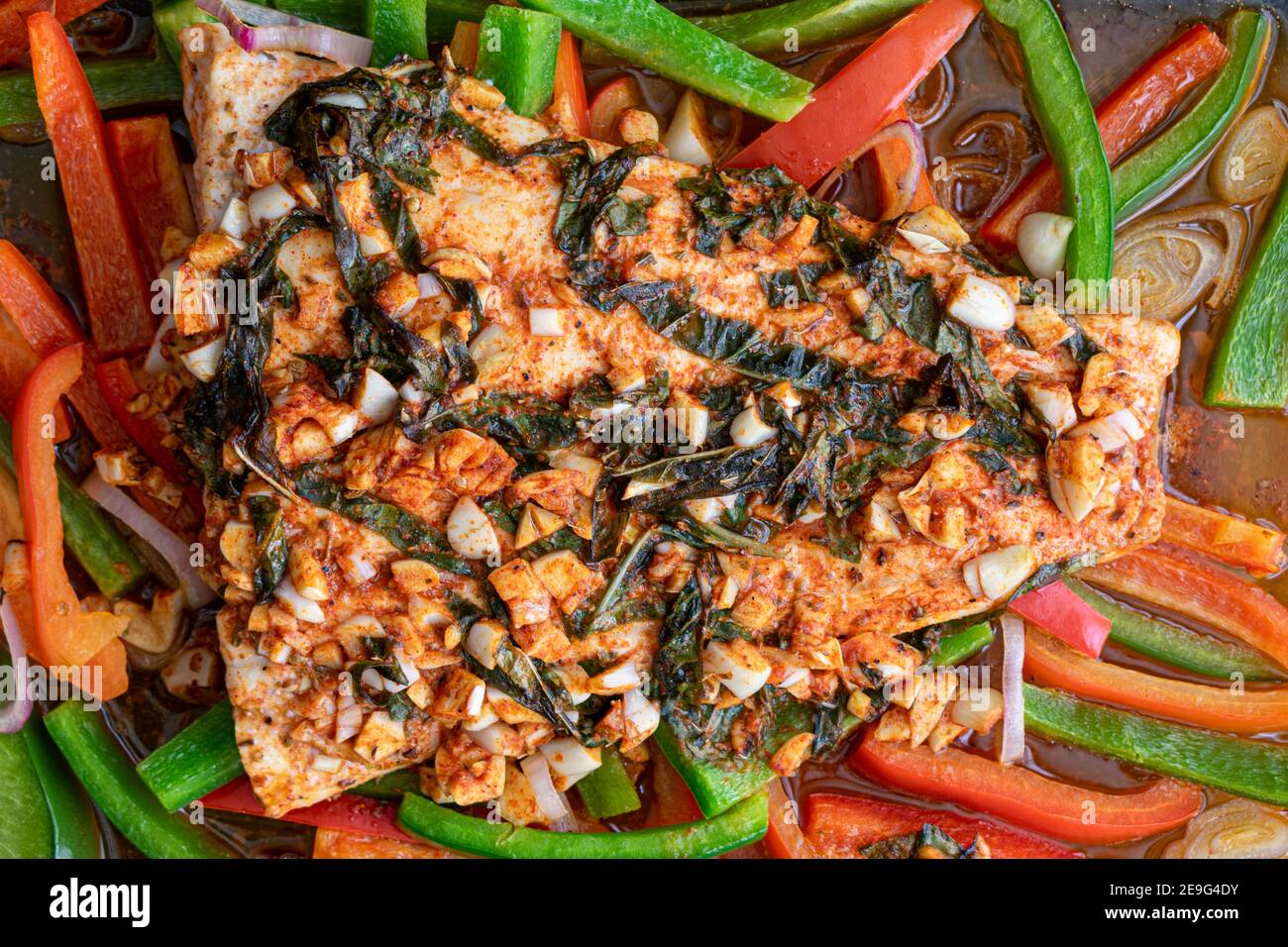 Baked Halibut with Garlic and Basil: A boneless fish fillet baked with ...