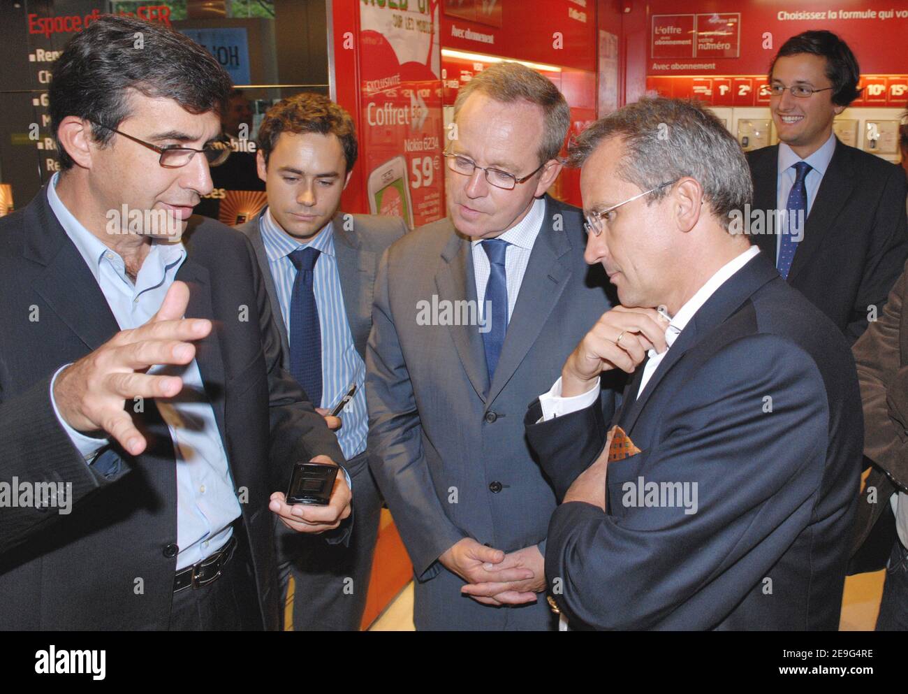 SFR CEO Frank Esser (right), helped by SFR VP Jean-Marc Tassetto (left ...