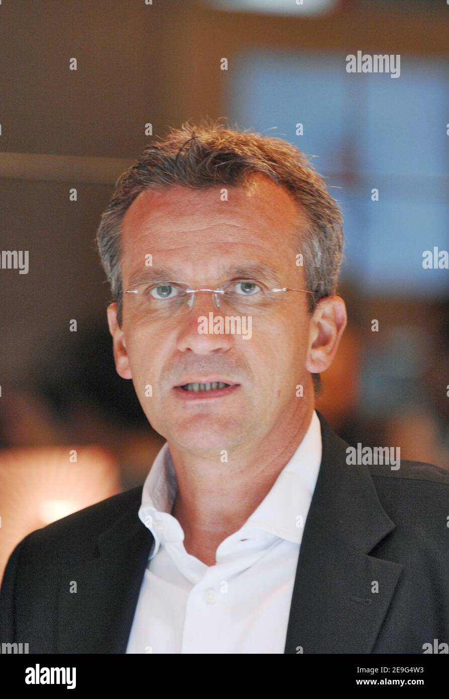 SFR CEO Frank Esser pictured at the Champs Elysees SFR flagship store ...