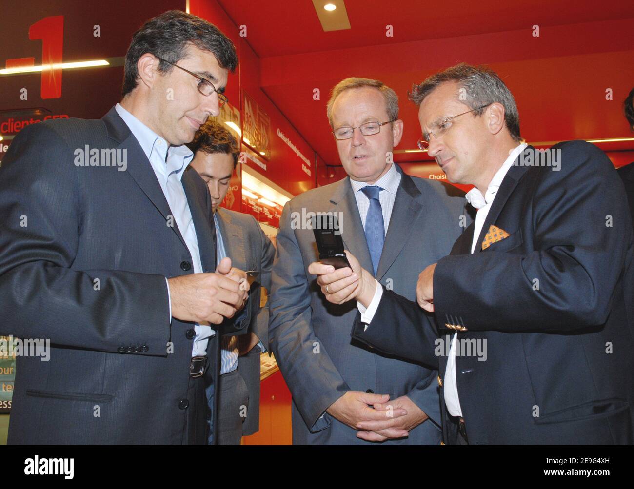 SFR CEO Frank Esser (right), helped by SFR VP Jean-Marc Tassetto (left ...