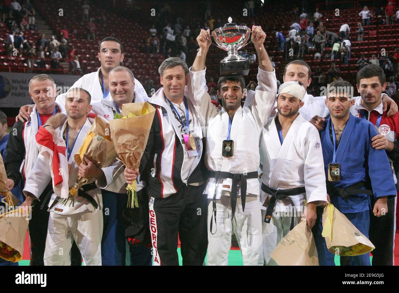Georgia's team celebrate and hold up the trophy after beating Russia in ...