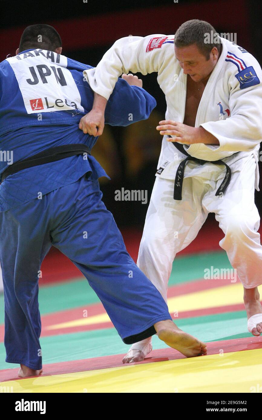France's Matthieu Bataille competes with Japan's Yohei Takai during the ...