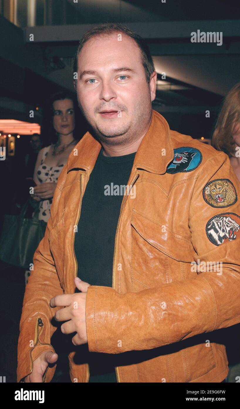 Cast member Sebastien Cauet poses for pictures as he arrives to the ...