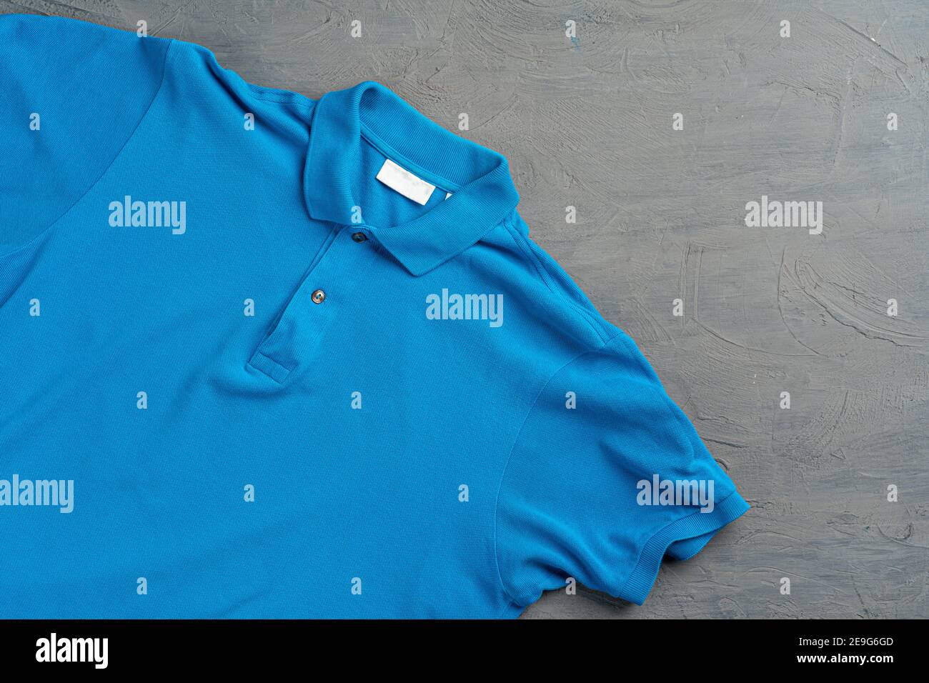Blue cotton polo t-shirt texture close up Stock Photo - Alamy